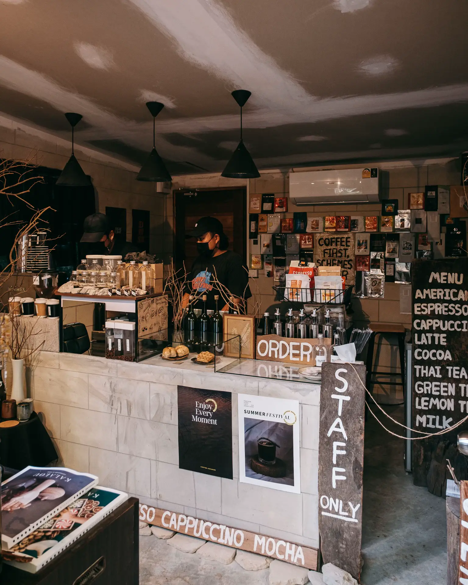 Ma-kham Home Cafe, a small cafe on a wide courtyard, under a big ...